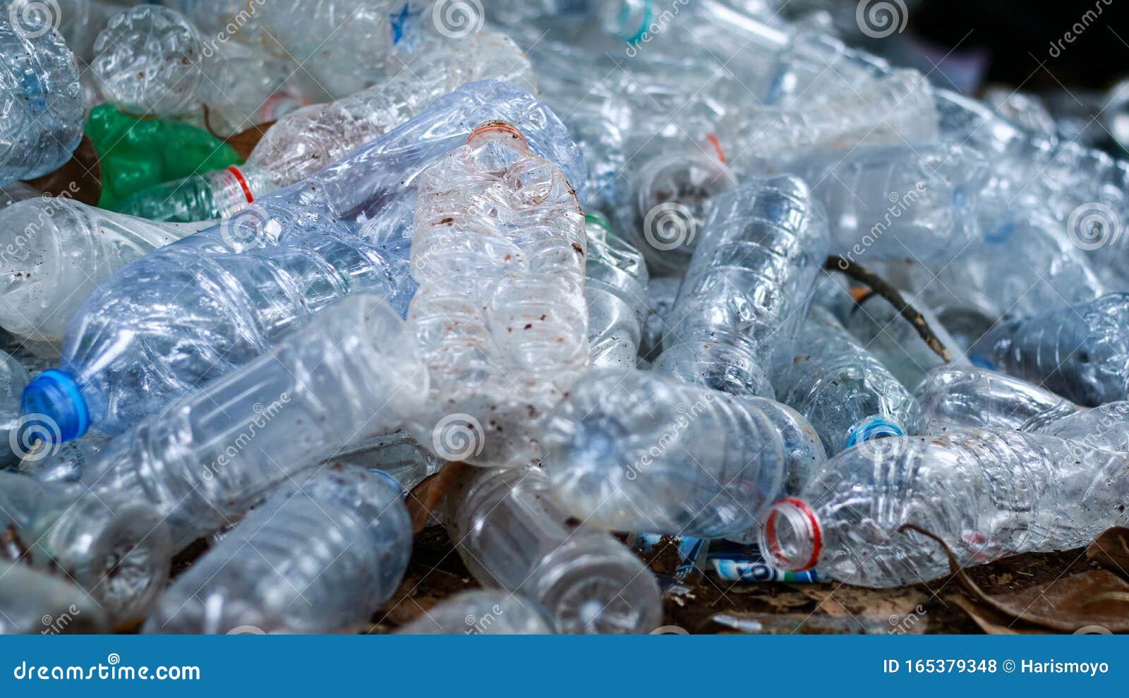Pile of plastic bottles stock photo. Image of water - 165379348
