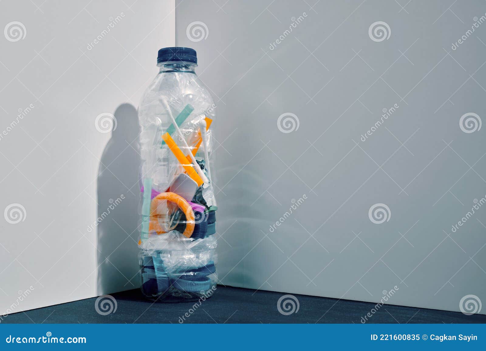Pile of Plastic Objects in a Plastic Drinking Water Bottle ...