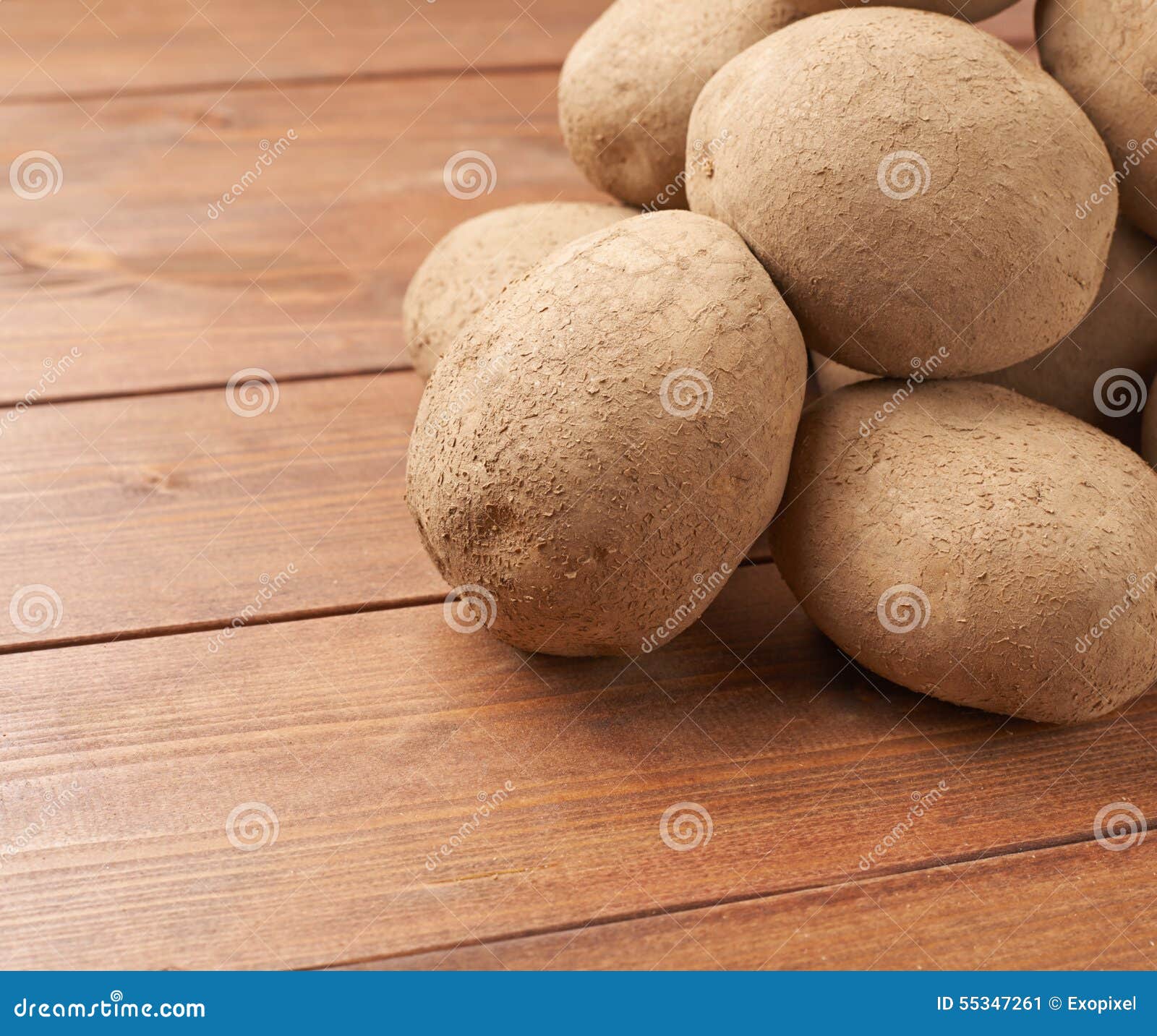Pile of Potatoes Over the Wooden Surface Stock Image - Image of dirty ...