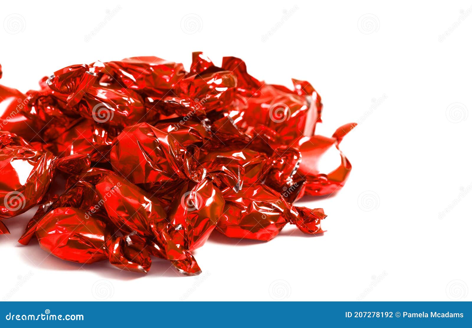 Pile of Red Wrapped Candy Isolated on a White Background Stock Photo ...