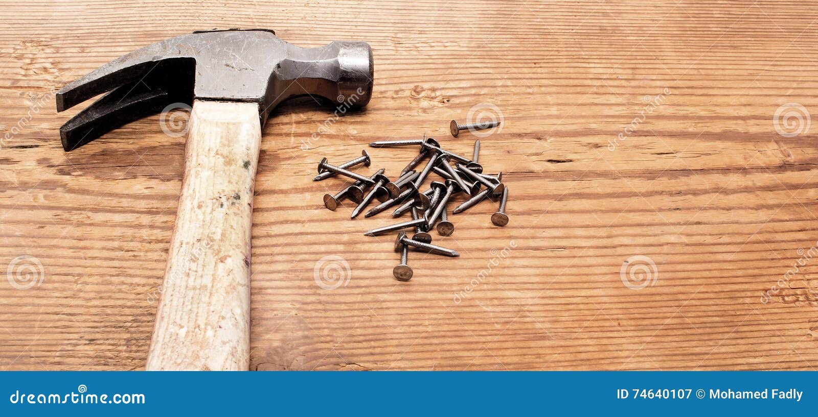 Pile of Rivets, Nails and a Hammer on Wooden Ground Stock Image - Image ...