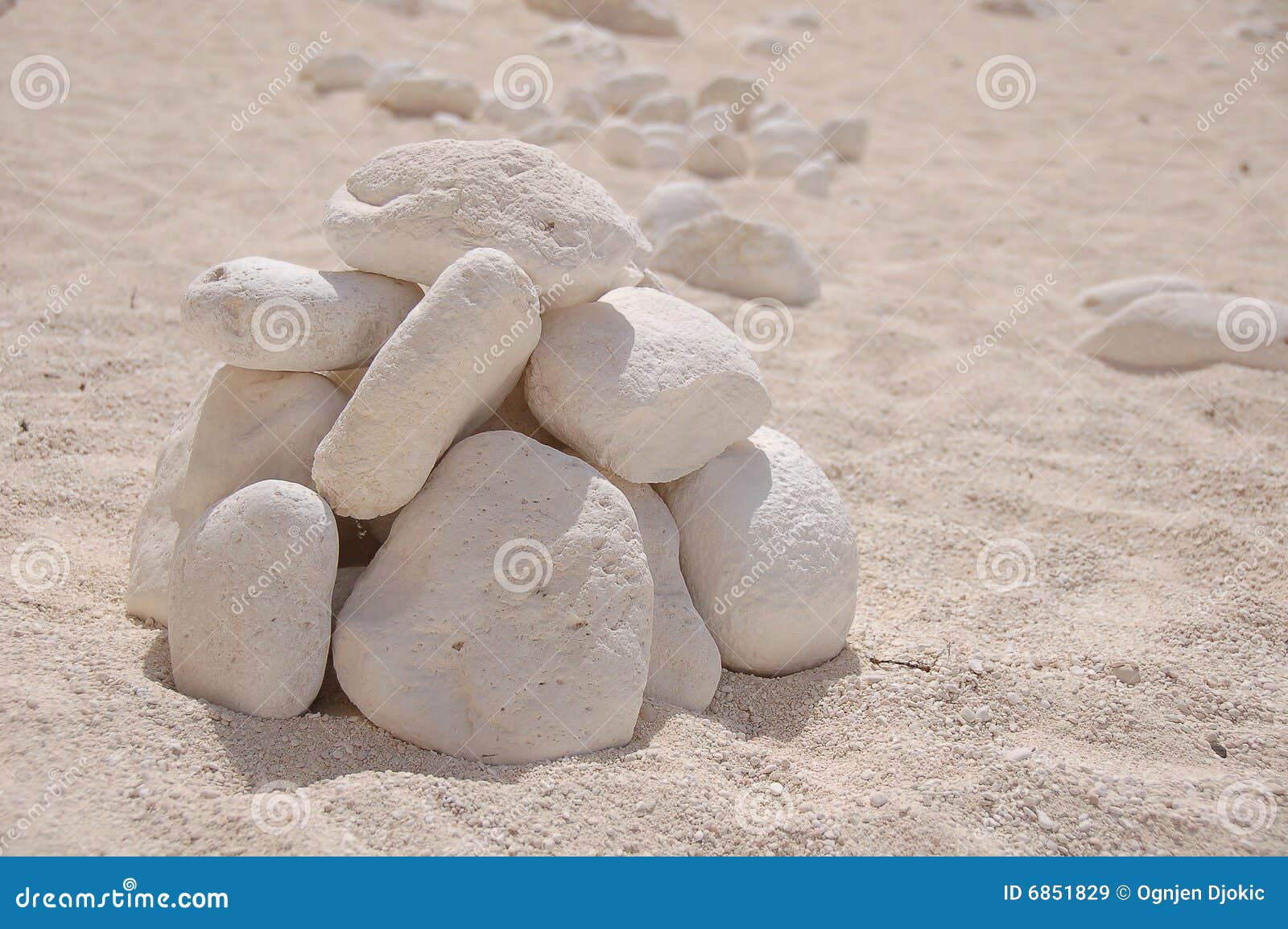 Pile of Rocks on Sandy Beach Stock Image - Image of outside, cairn: 6851829