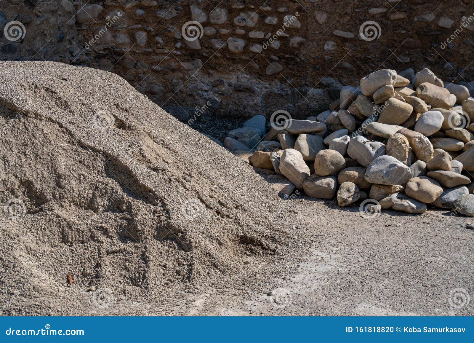 Pile of Rounded Stones Piled in the Side of the Road Stock Photo ...