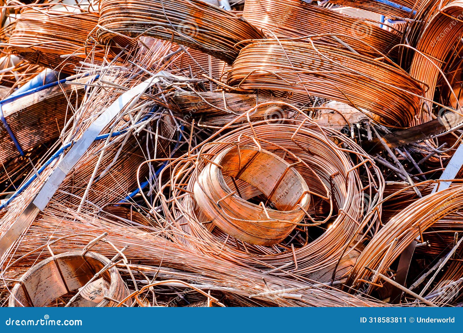 A Pile of Rusted Metal with a Blue Wire in the Middle Stock Image ...
