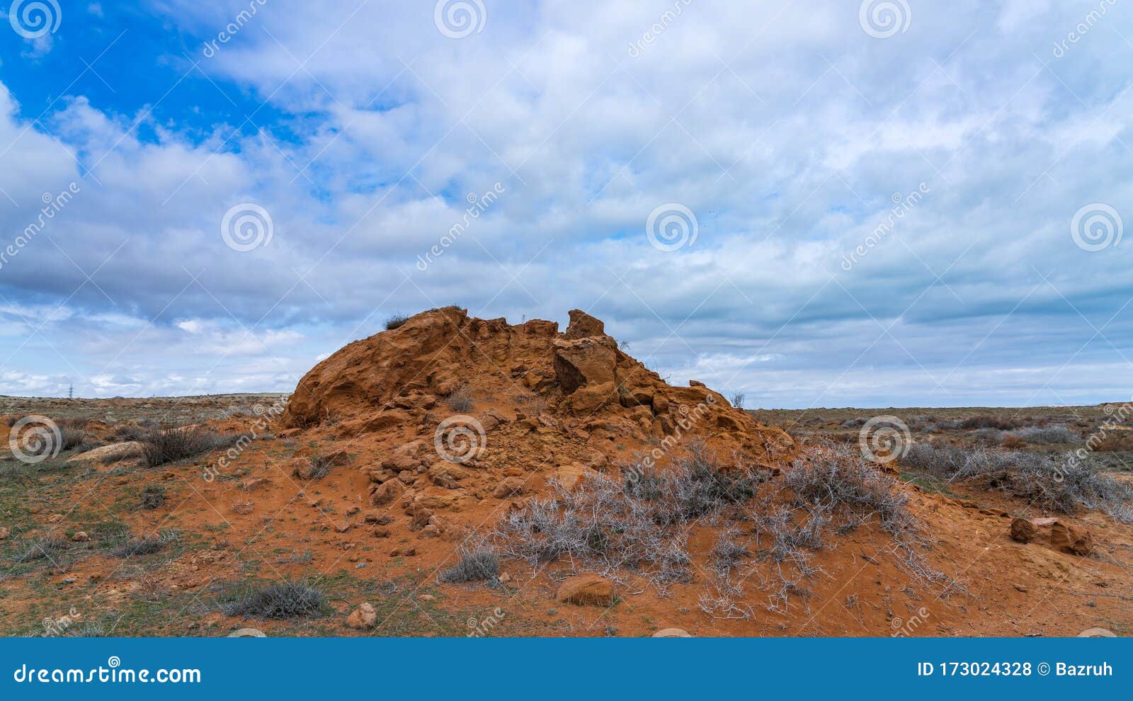 A pile of sand in a field stock photo. Image of heap - 173024328