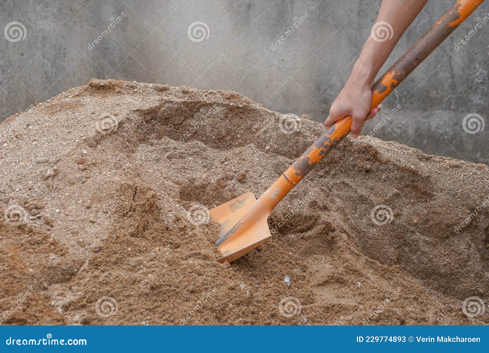 Pile of Sand, Hand of a Construction Worker Scooping Sand for Mix ...