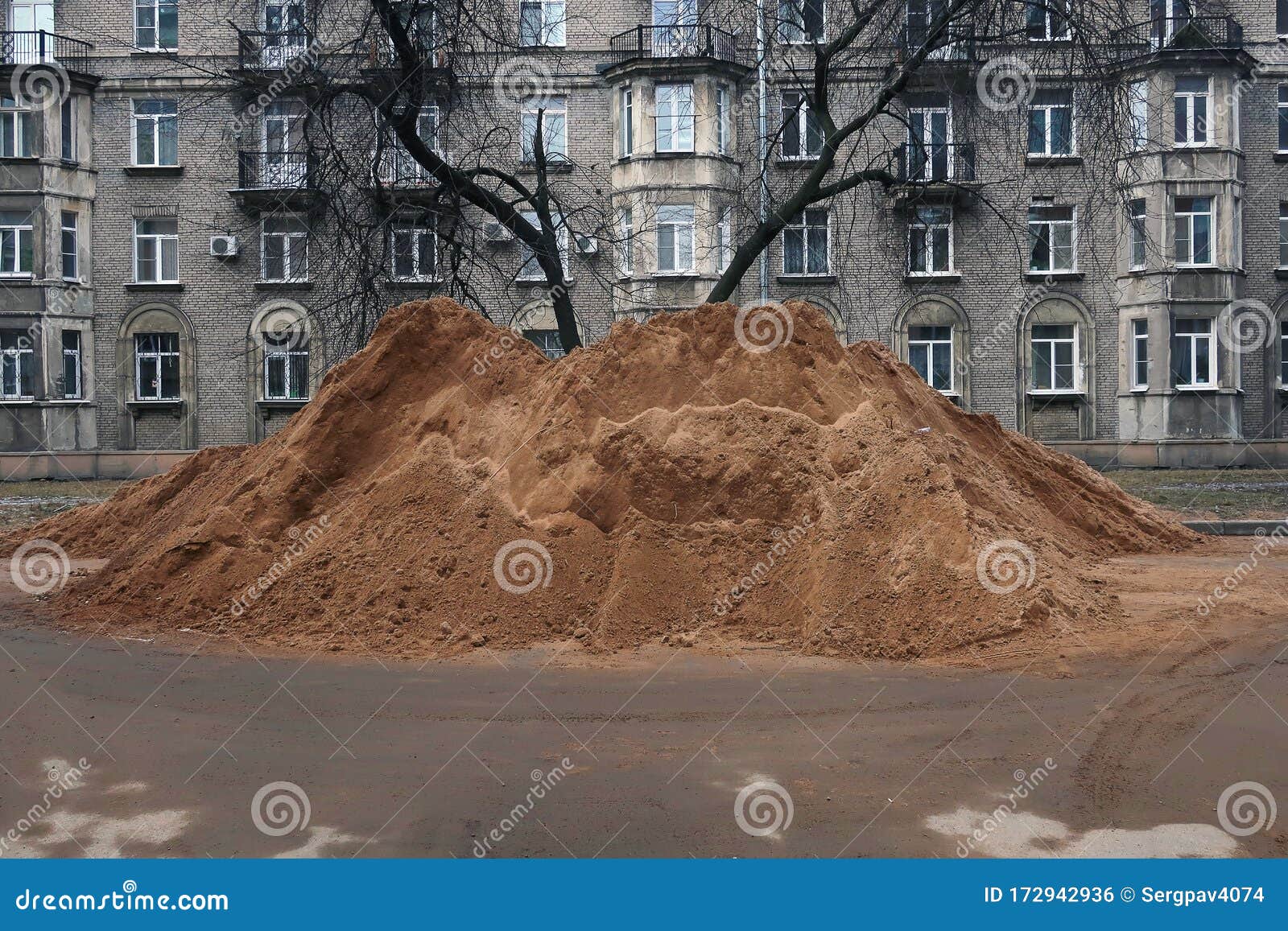 A Pile of Sand Poured on the Pavement Stock Photo - Image of ...