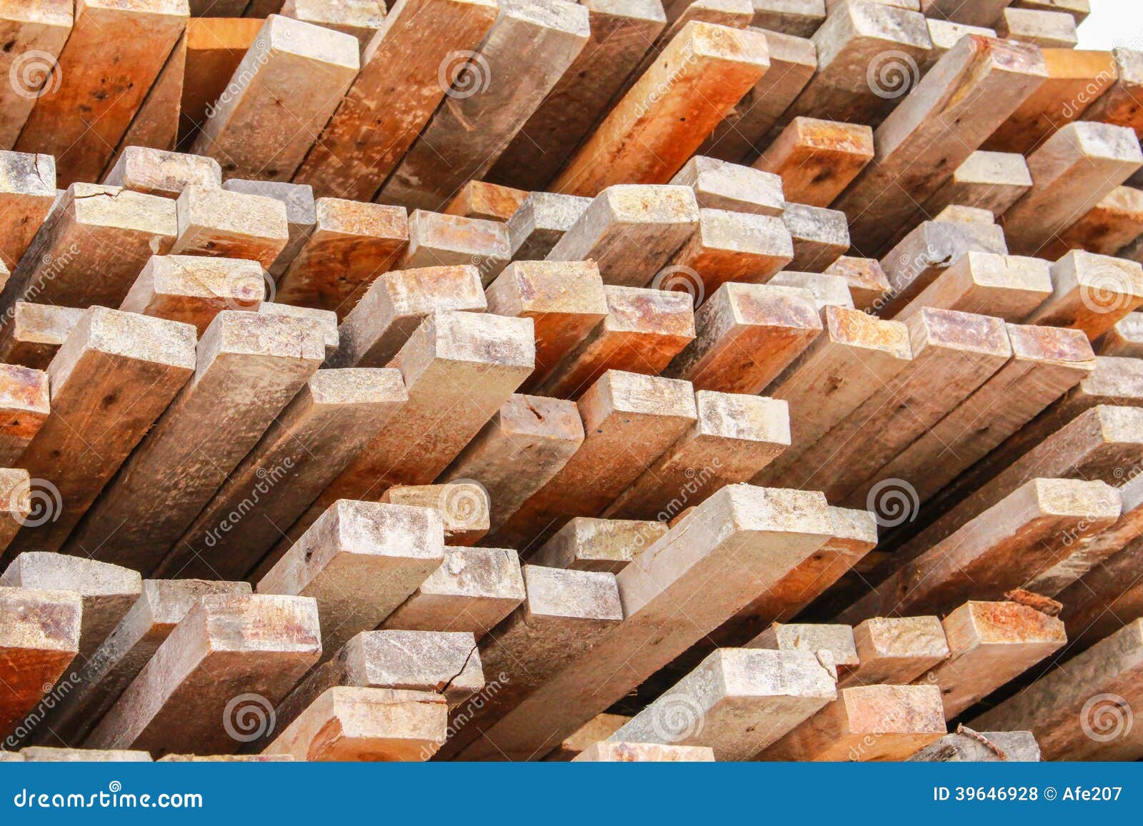 Pile of sawed wood planks stock photo. Image of sawdust - 39646928