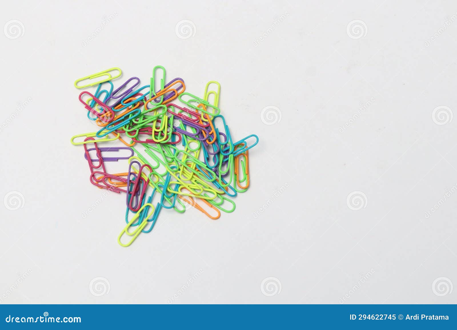 A Pile of Several Colorful Paper Clips. a Tool for Clamping and Joining ...