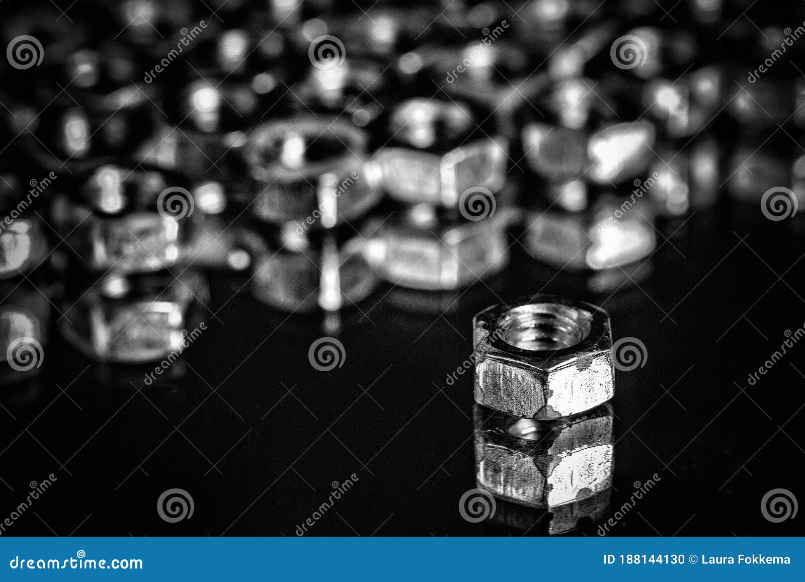 Pile of Silver Colored Nuts on a Black Background Stock Photo - Image ...