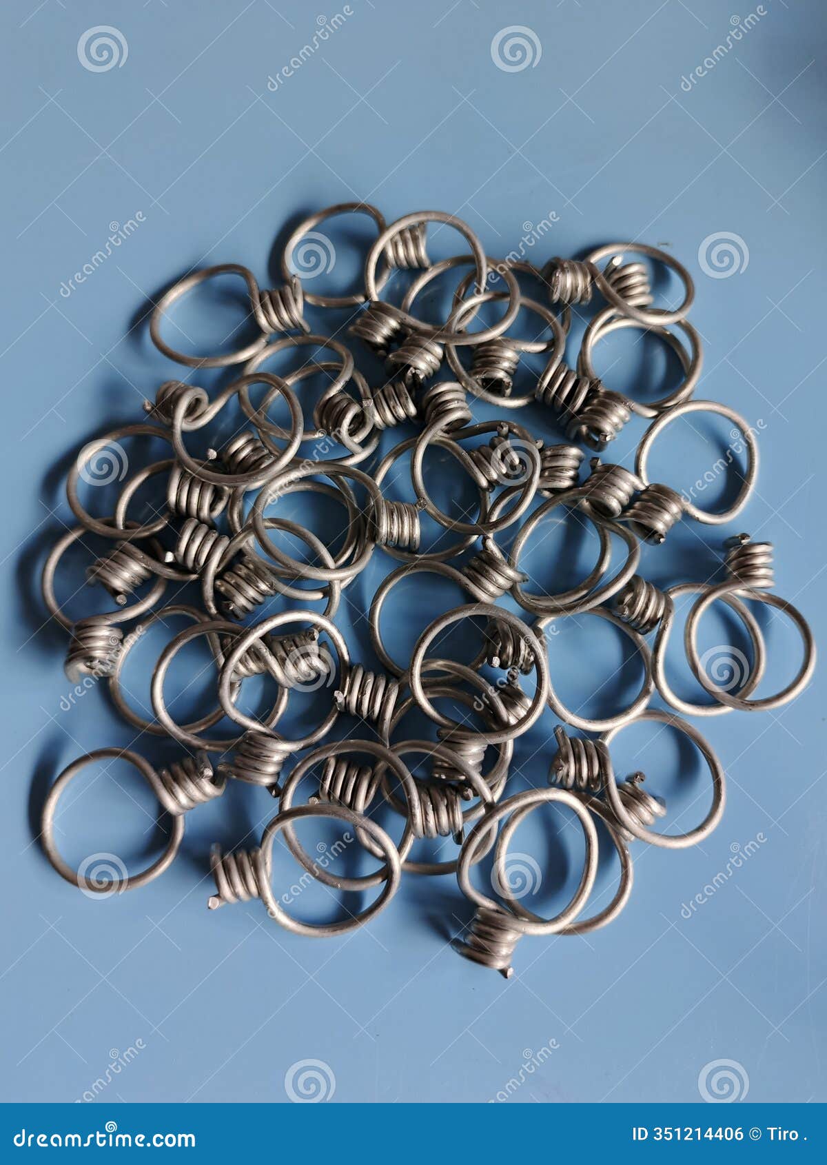 Pile of Silver Metal Spring Rings for Industrial or Craft Use. Stock ...