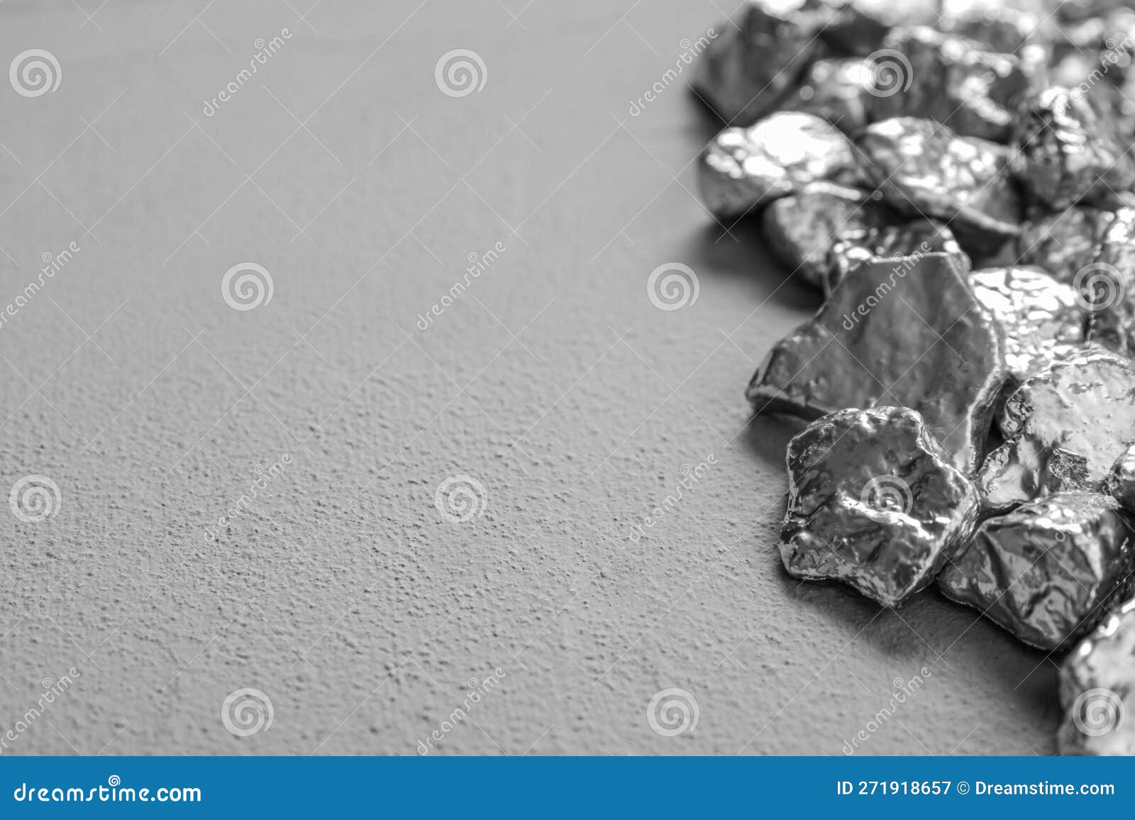 Pile of Silver Nuggets on Grey Table, Closeup. Space for Text Stock ...