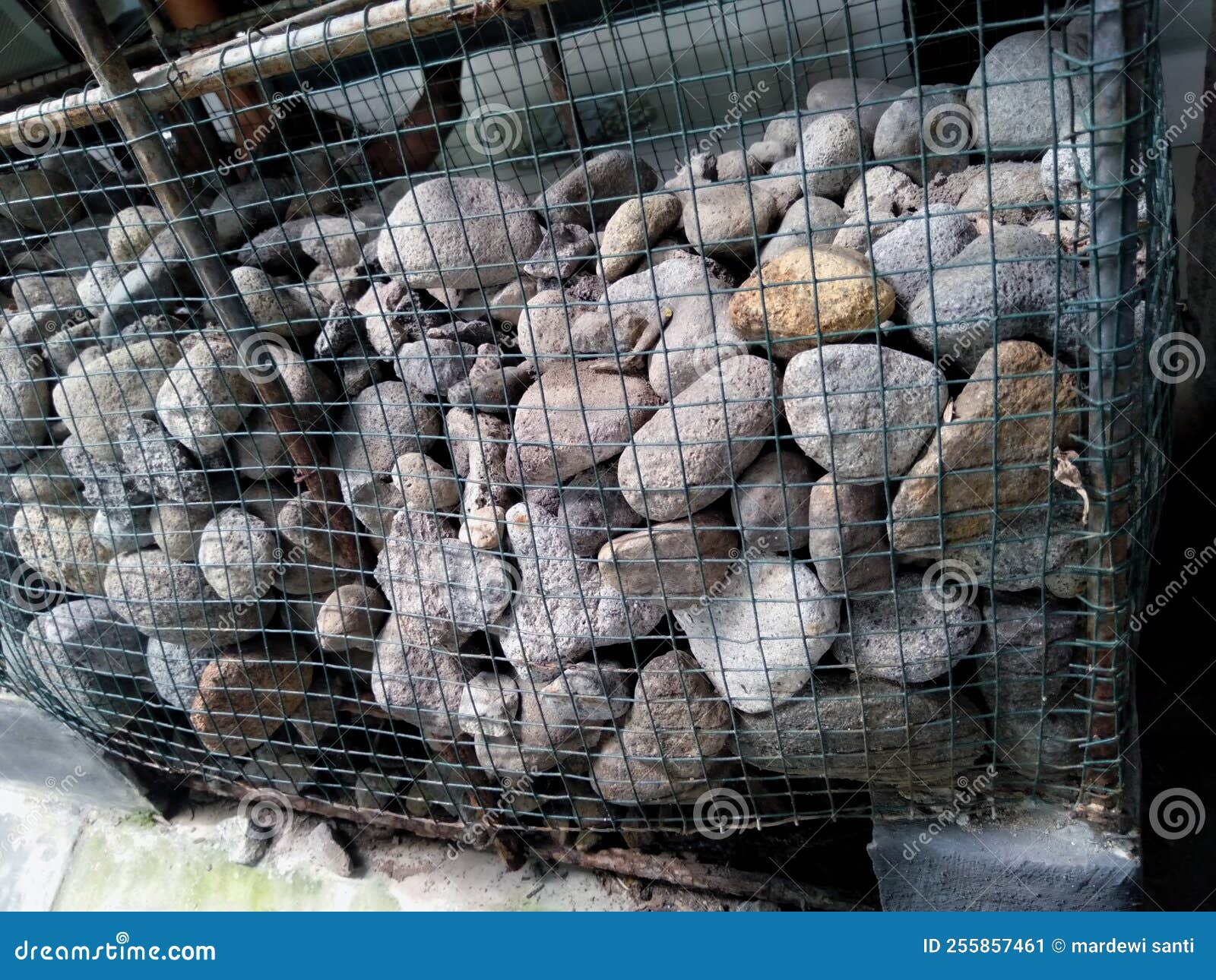 Pile of Small Stones in a Wire Basket Stock Image - Image of wire ...
