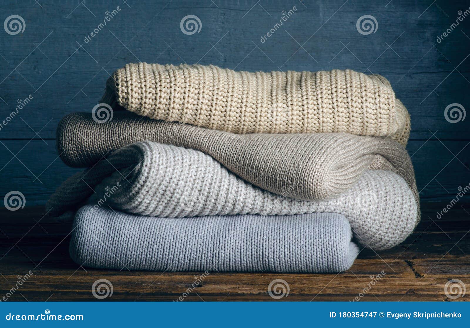 Pile Stack Folded of Knitted Warm Clothes on Wooden Background ...