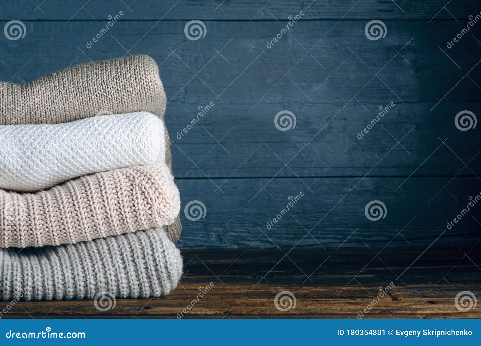 Pile Stack Folded of Knitted Warm Clothes on Wooden Background ...