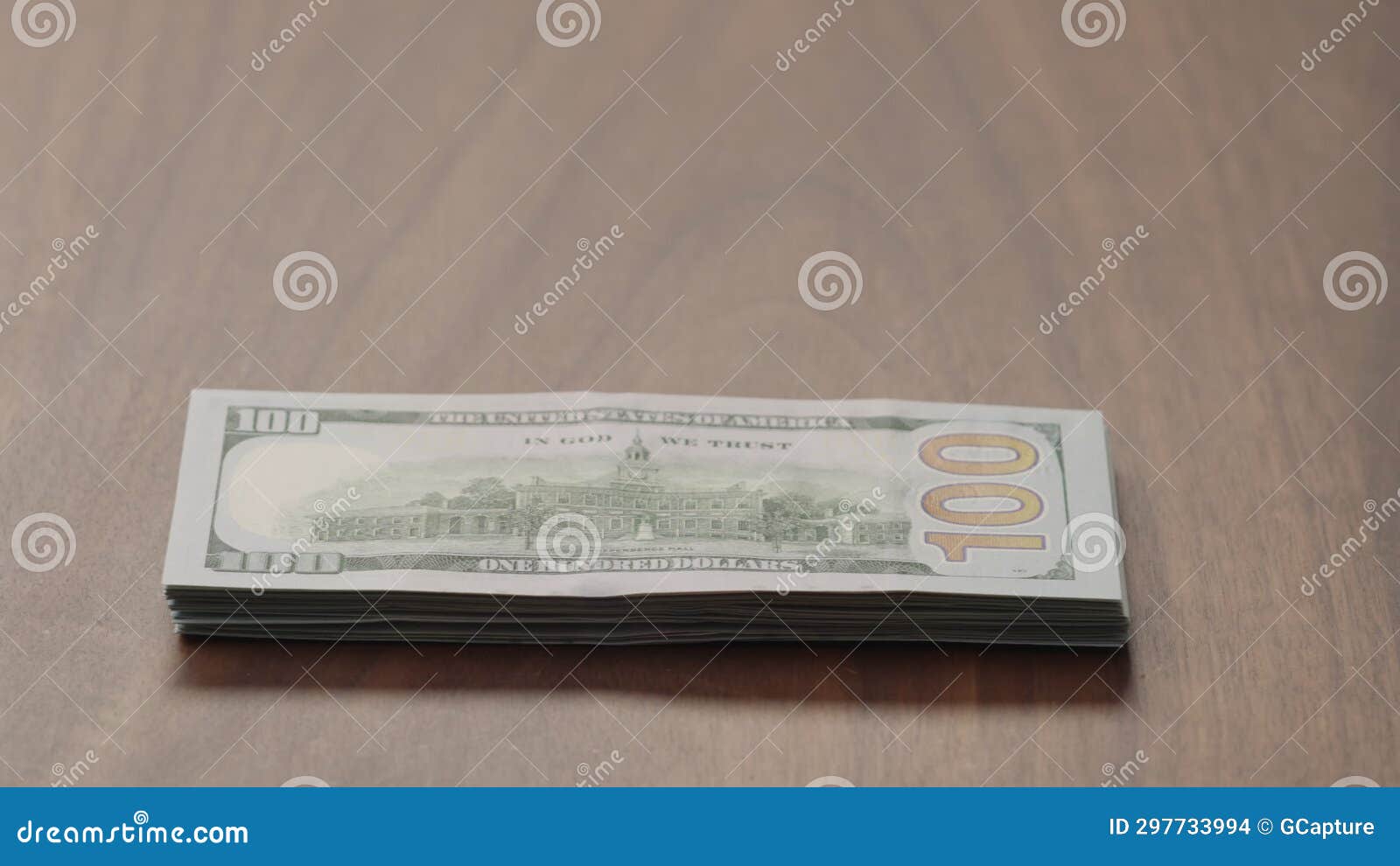 Pile Stack of Hundred Dollar Bills on Walnut Table Slide Shot Stock ...