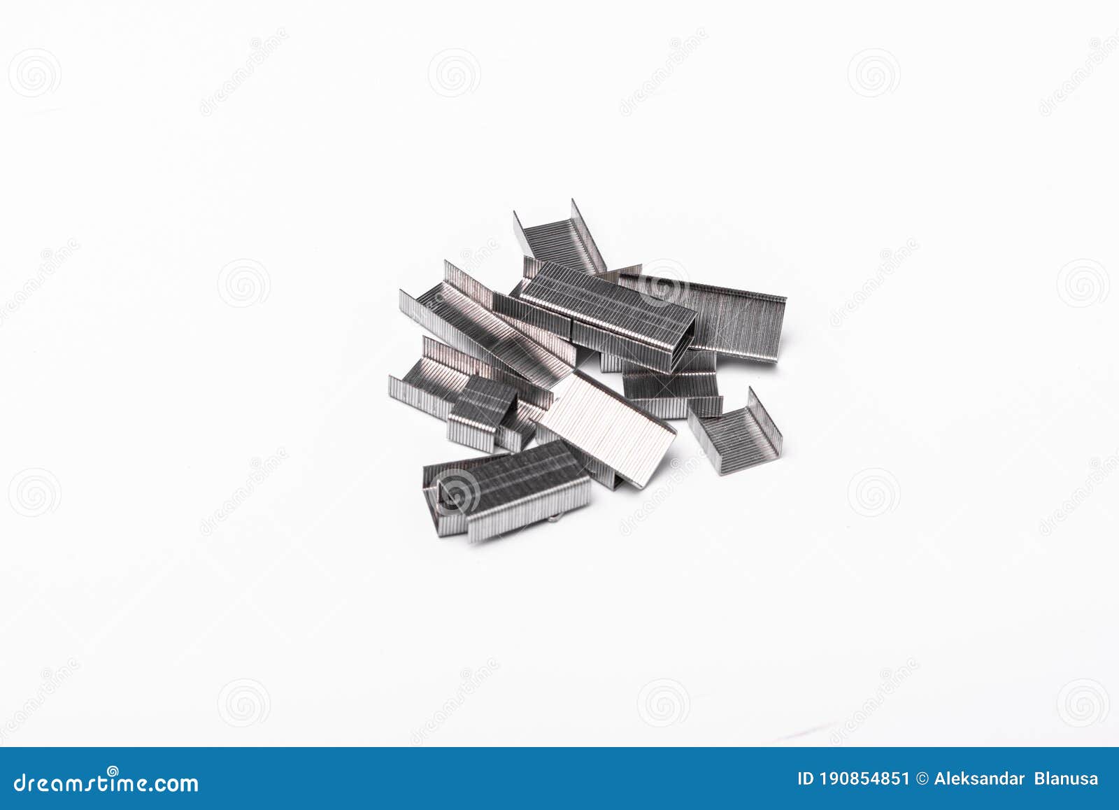 A Pile of Staple Inserts Insulated on a White Surface Stock Image ...