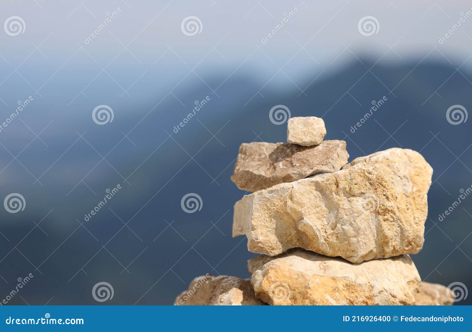 Pile of Stones Indicating the Direction in the Mountains Stock Photo ...