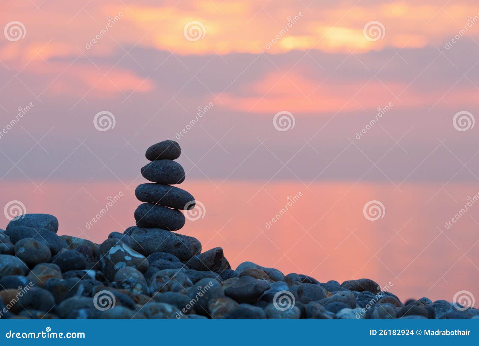 Pile of stones at sunrise stock photo. Image of relaxation - 26182924