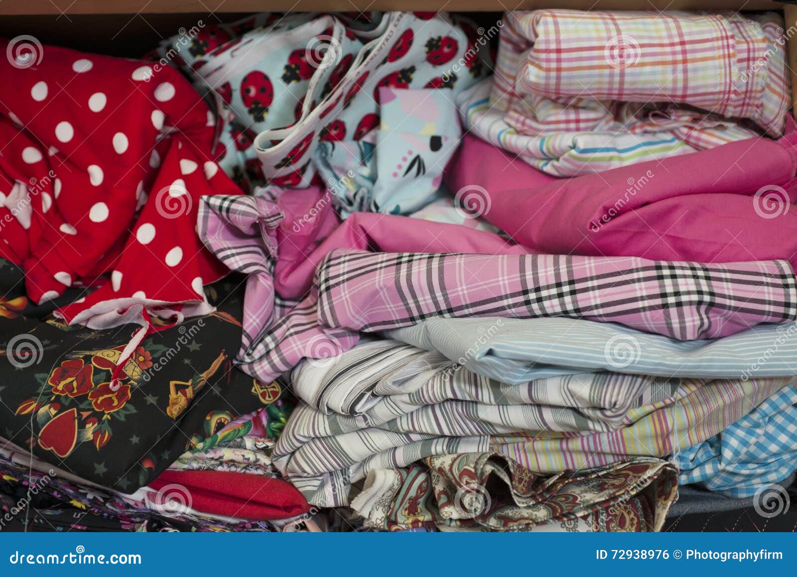Pile of Textile of Various Colours and Patterns Stock Photo - Image of ...