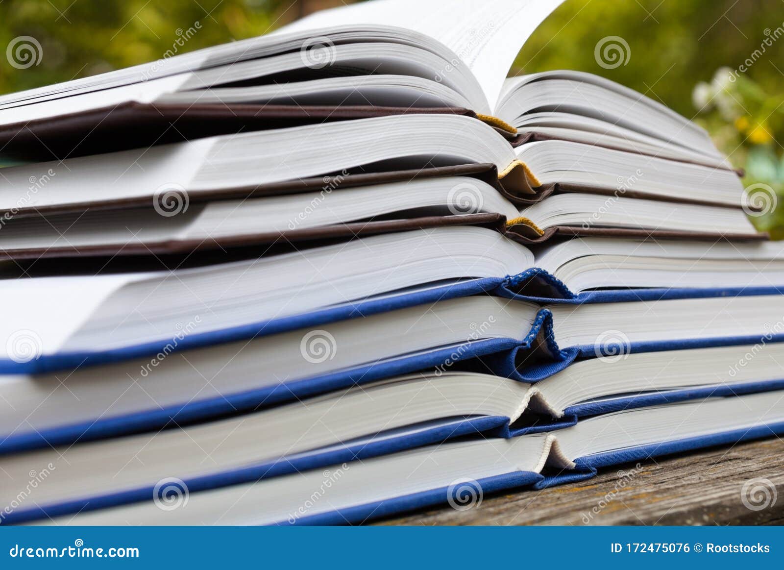 Pile of thick open books stock photo. Image of bookshelf - 172475076