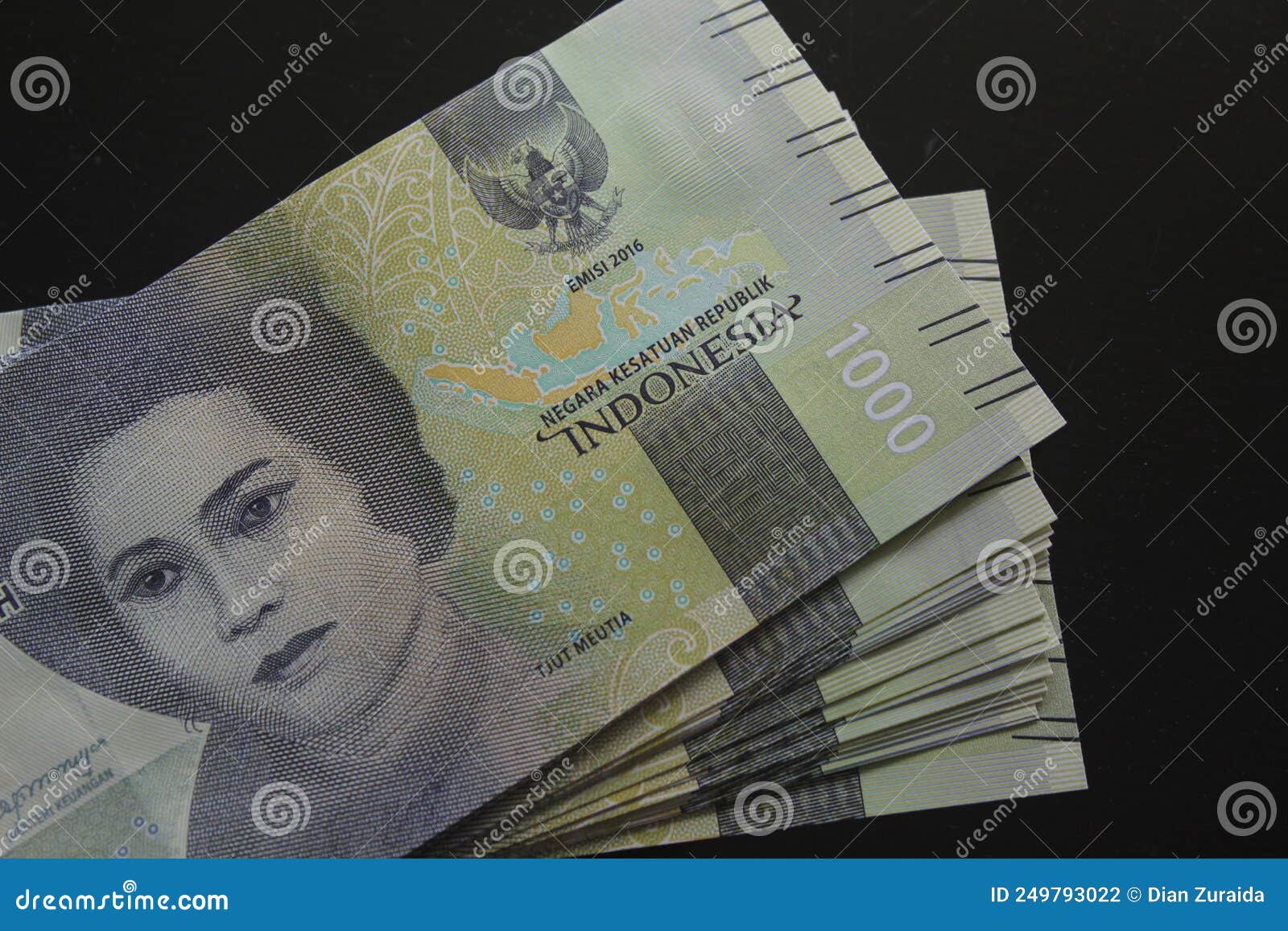 Thousand Rupiah Banknotes on a Black Background Stock Photo - Image of ...