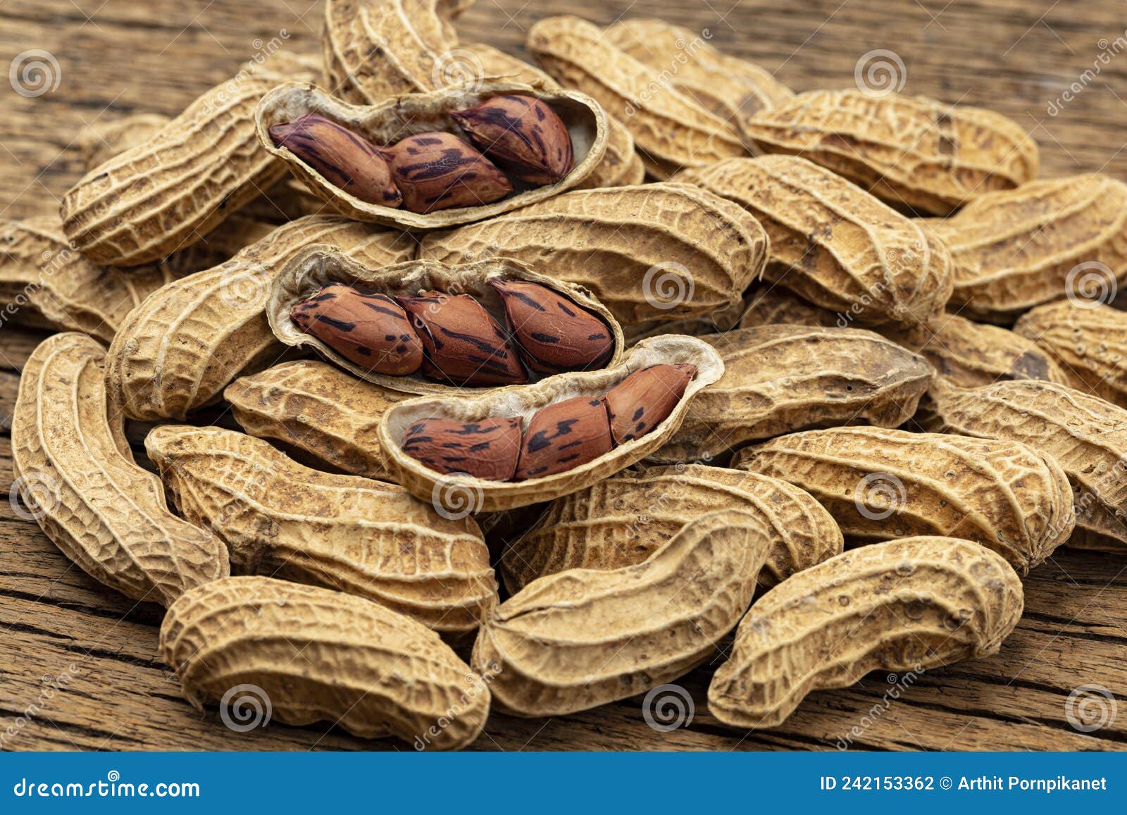 Pile of Tiger Peanuts on Wooden Background Stock Photo - Image of ...