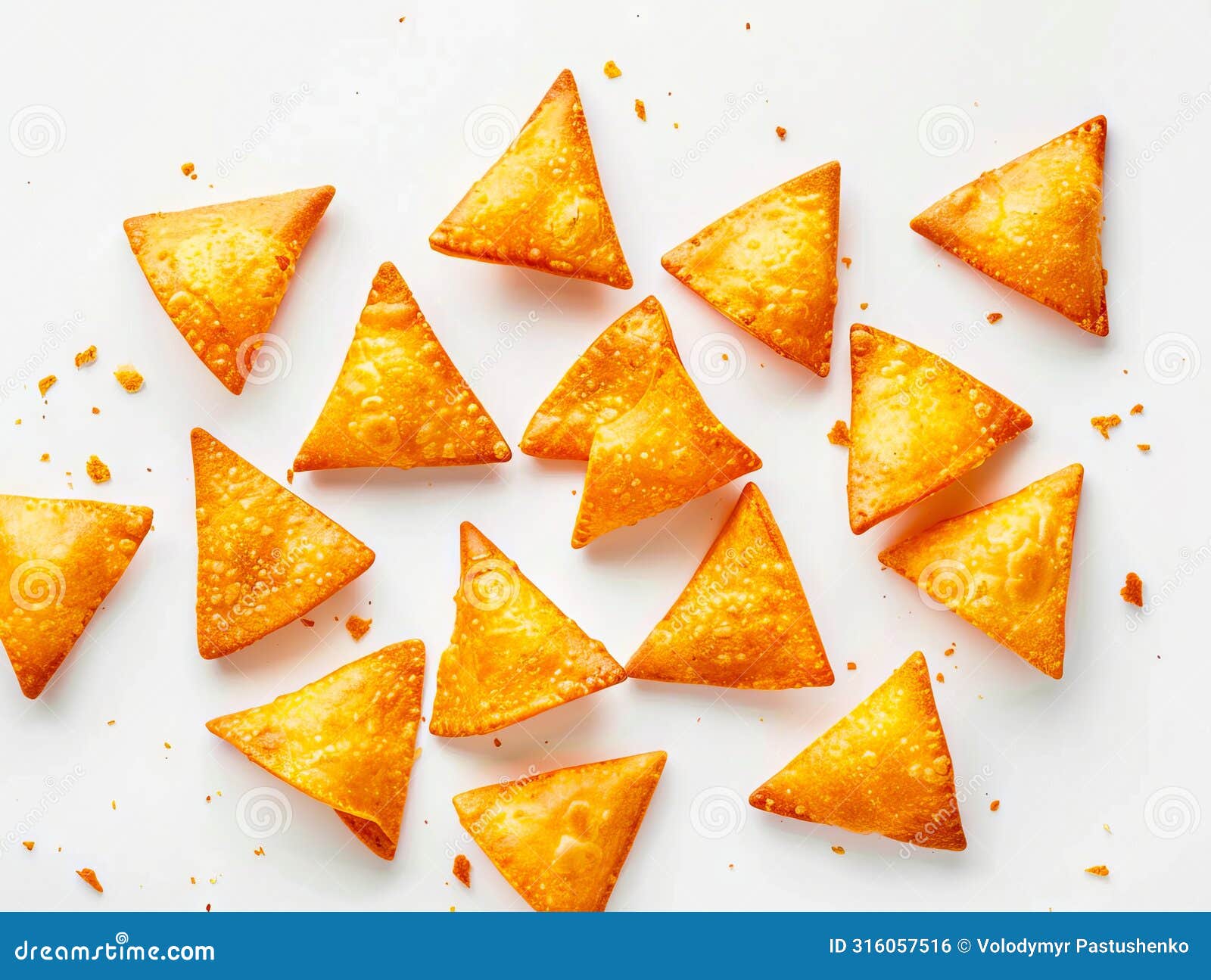 A Pile of Triangles Made from Fried Dough Stock Photo - Image of white ...