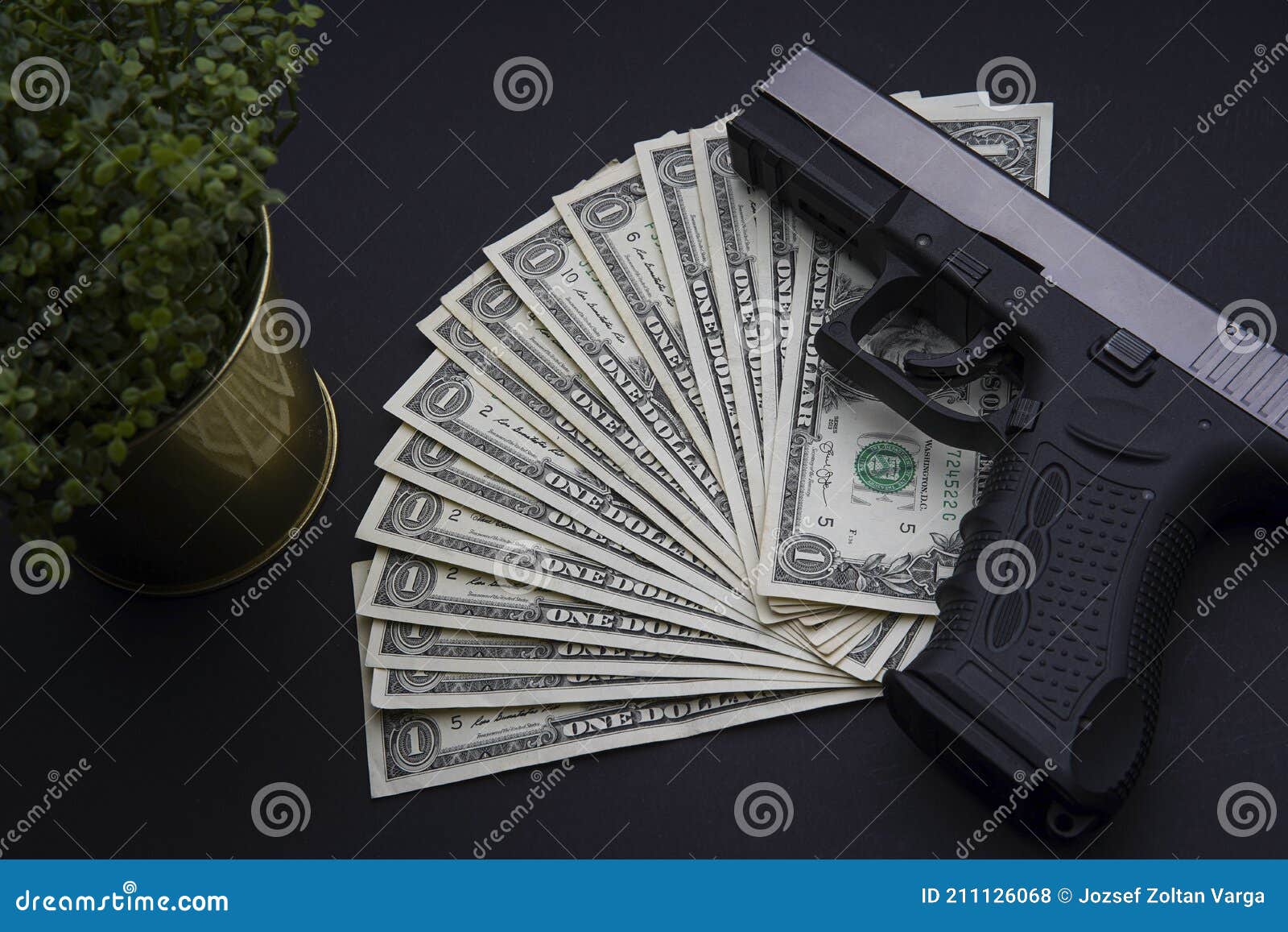 Pile of US Dollar Cash and a Black Gun. Stock Photo - Image of currency ...