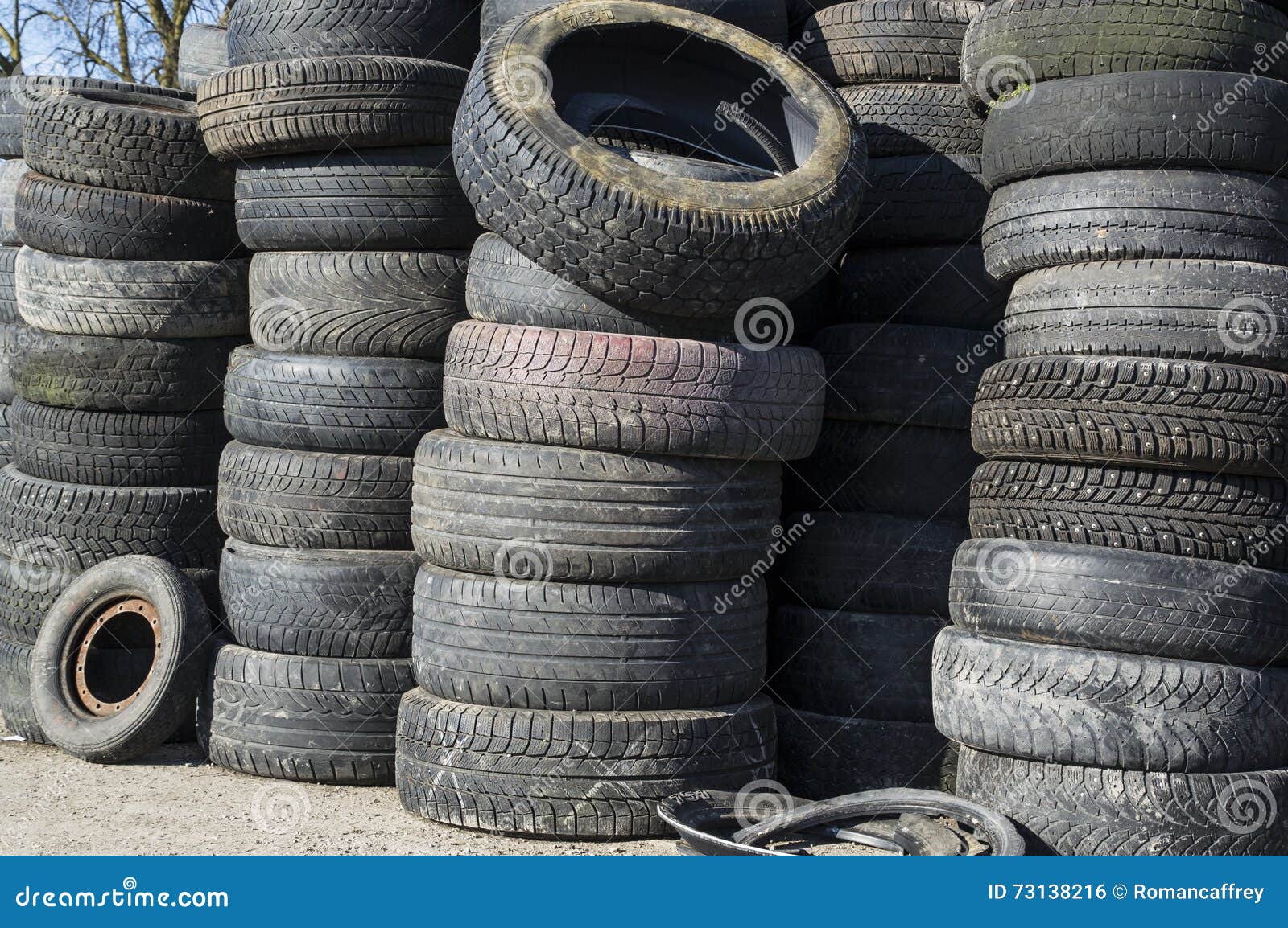 A Pile of Used Car Tires Stacked in a Rubber Tower Stock Photo - Image ...