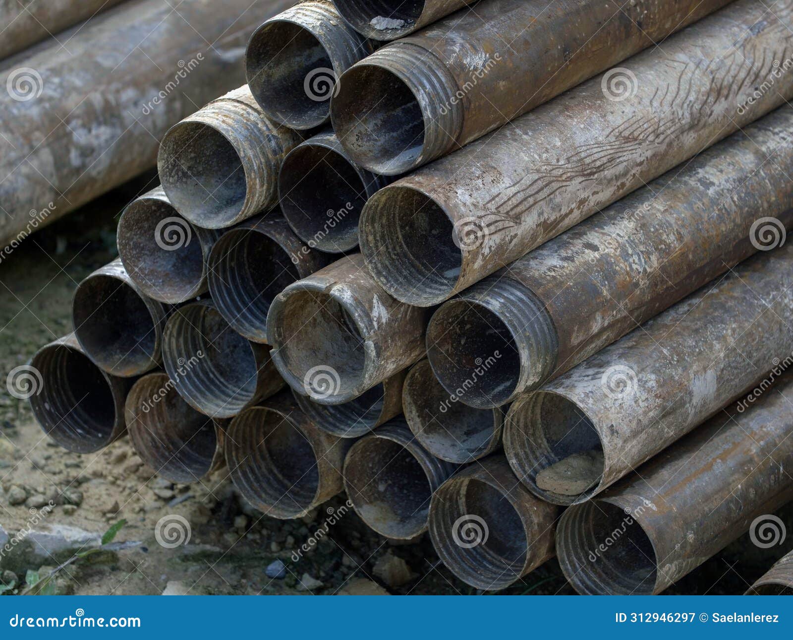 Pile of Used Drilling Pipes Stock Image - Image of material, storage ...