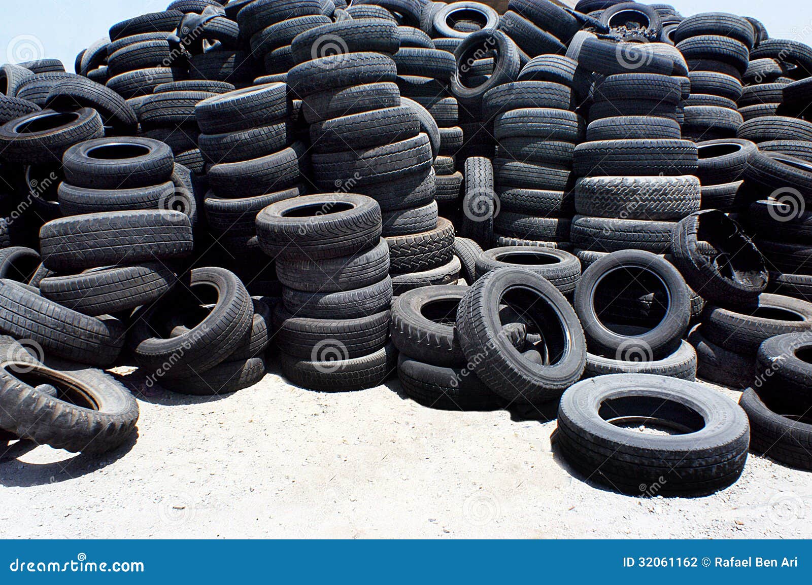 Old Used Rubber Car Tyre And Plastic Waste Discarded On Sea Coast ...
