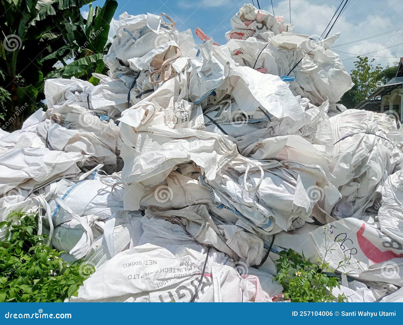 Pile of used white sacks stock photo. Image of waste - 257104006