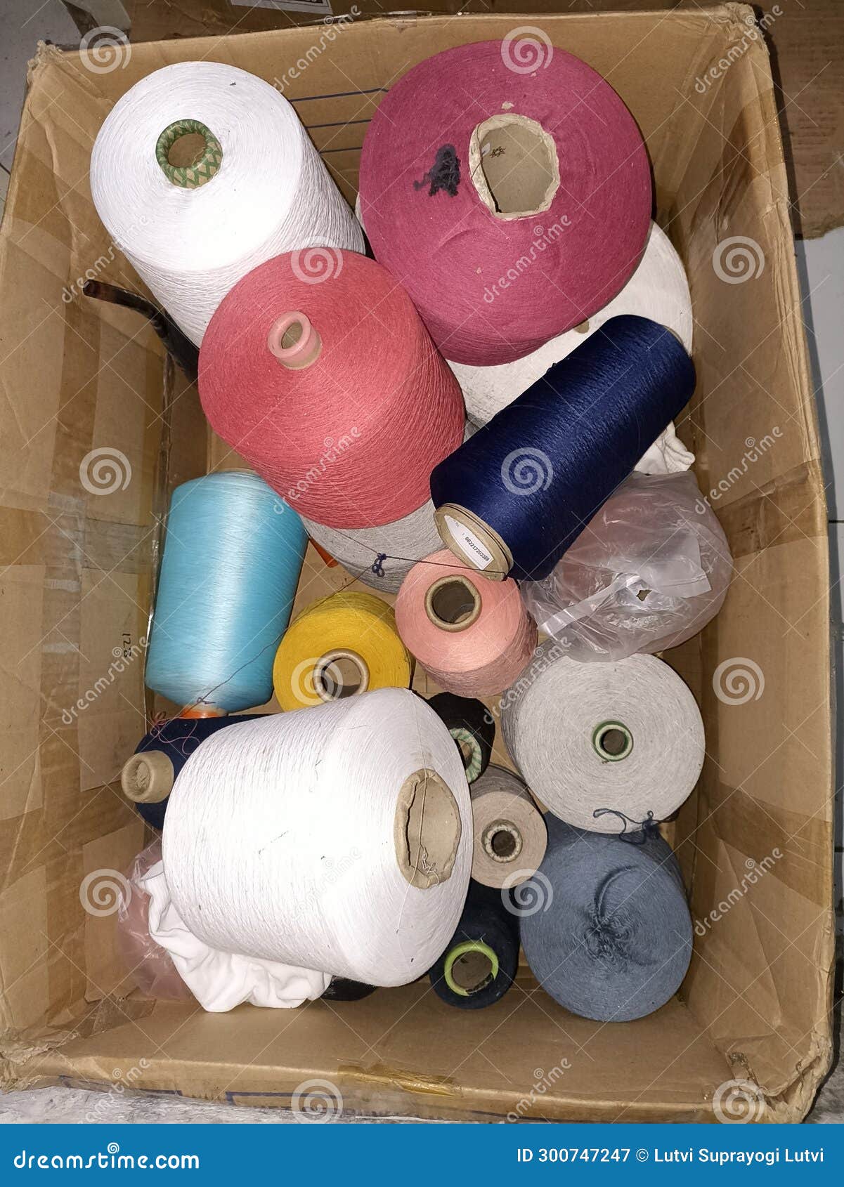 A Pile of Various Threads in a Cardboard Box Stock Image - Image of ...
