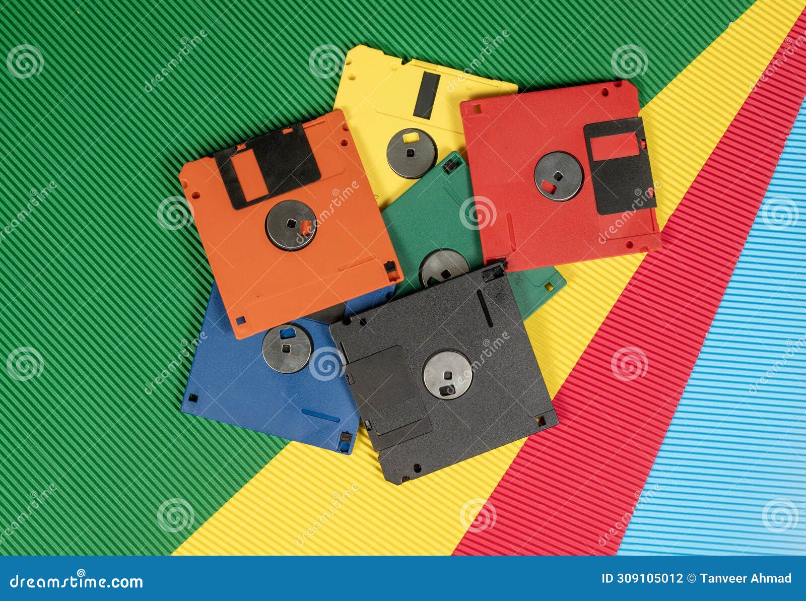 Pile of Vintage Floppy Disks in Multi-colored Theme Technology ...