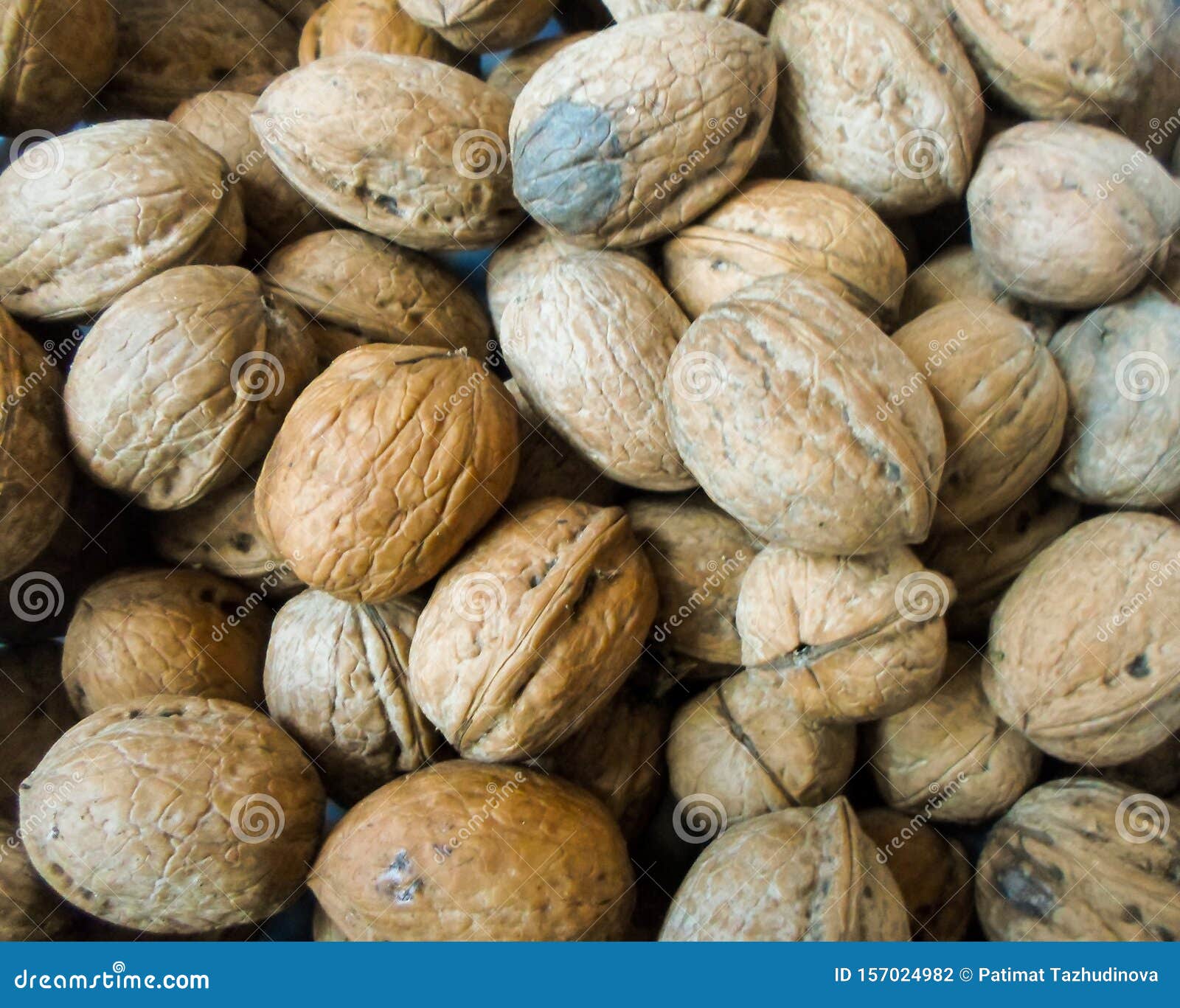 A Pile of Walnuts for a Background Image. Walnut Shell Stock Photo ...