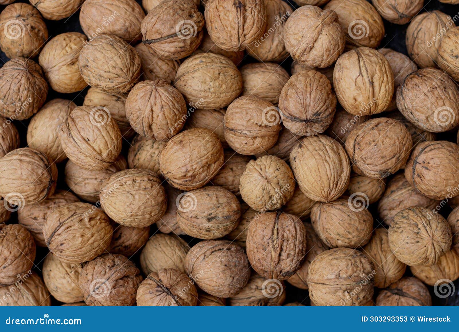 A Pile of Walnuts Laying Down on Top of Each Other Stock Image - Image ...