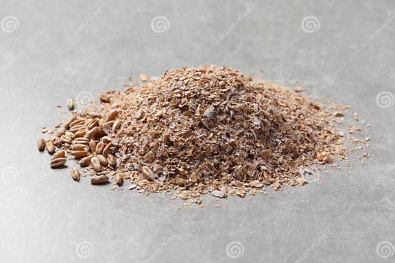 Pile of Wheat Bran on Grey Table Stock Photo - Image of product ...