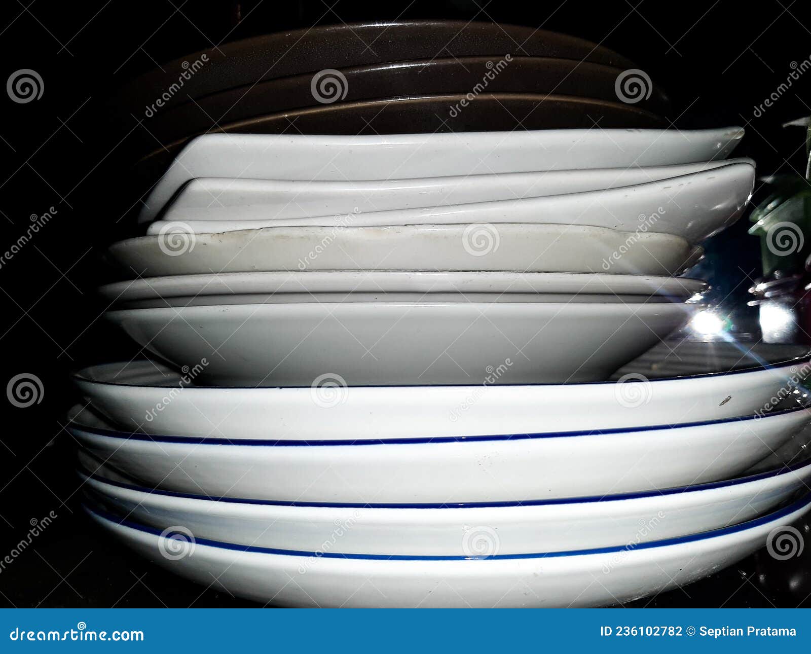Pile of Plates on the Table Stock Photo - Image of wheel, tire: 236102782