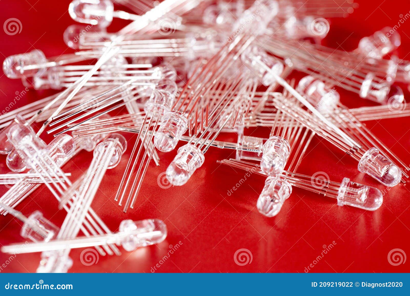 Pile of White LED Diode on Red Background. Electronic Components and ...