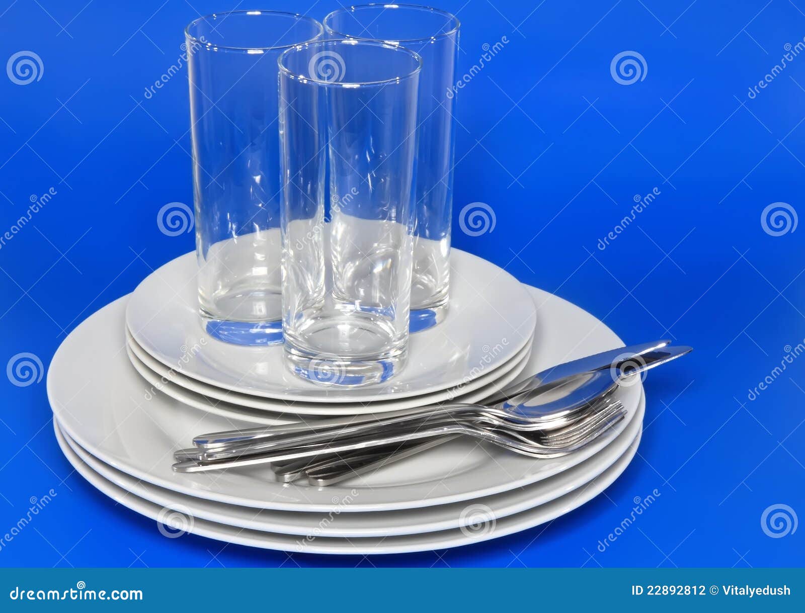 Pile of white plates stock photo. Image of isolated, blue - 22892812