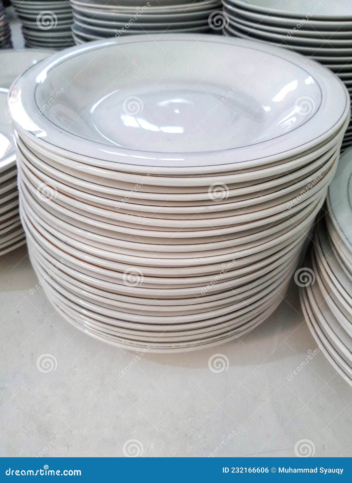 Pile of White Plates in the Kitchen To Put Rice and Side Dishes Stock ...