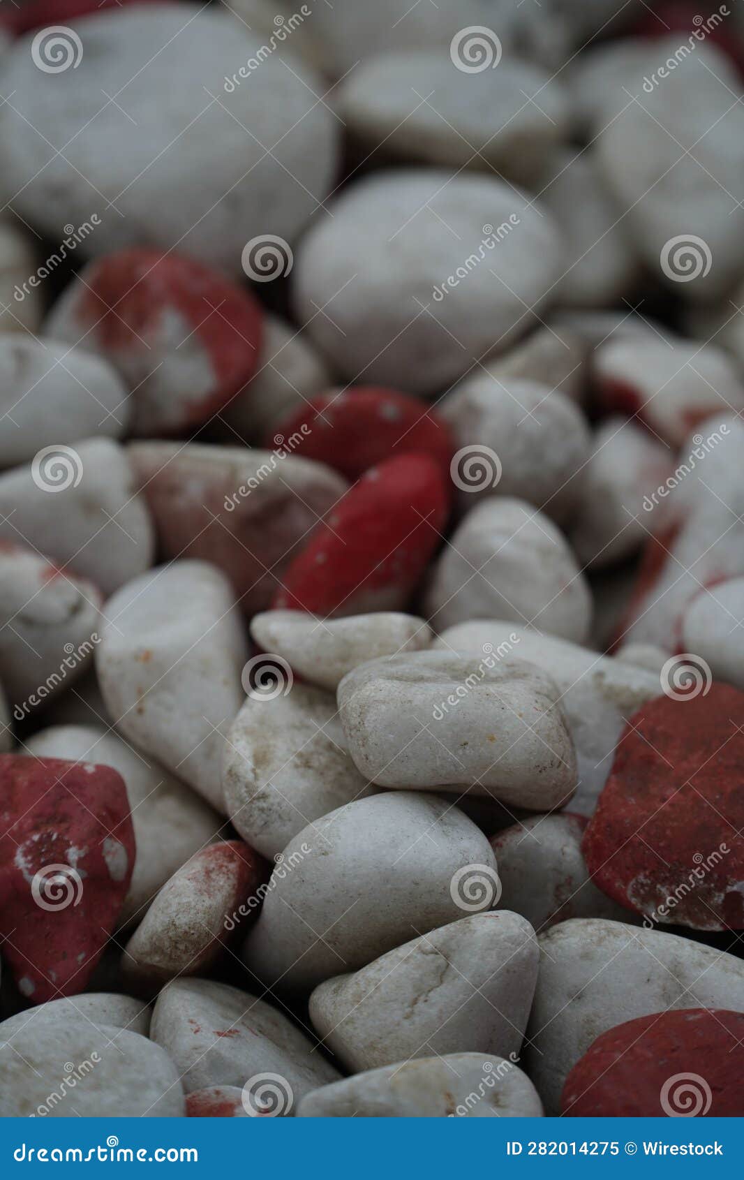 Pile of White and Red Rocks Placed on the Sand Stock Image - Image of ...