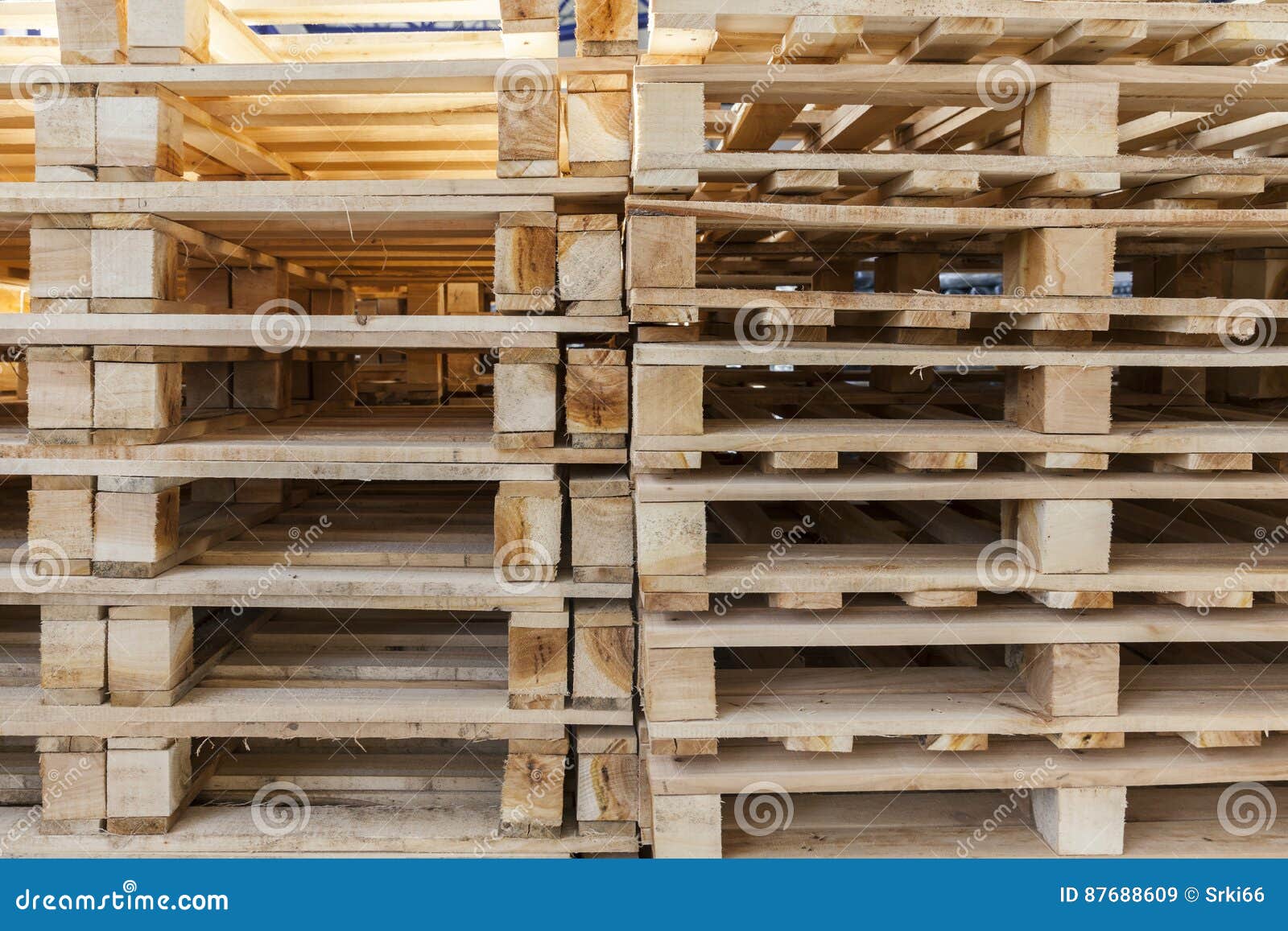 On a Pile of Wooden Pallets Stock Image - Image of stack, white: 87688609