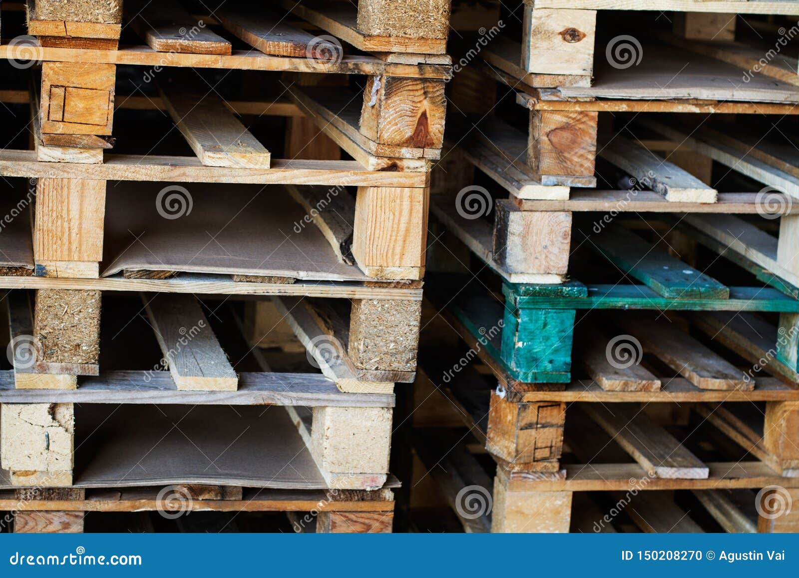 A pile of wooden pallets stock photo. Image of business - 150208270
