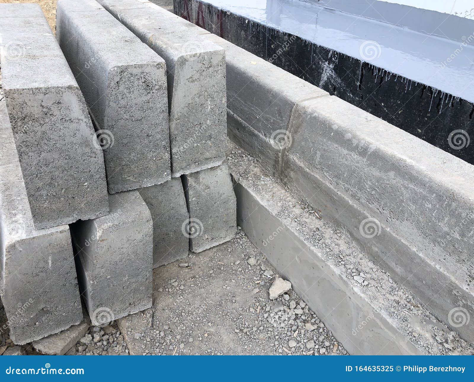Piled Concrete Curbstones. Construction Material for Road Construction ...