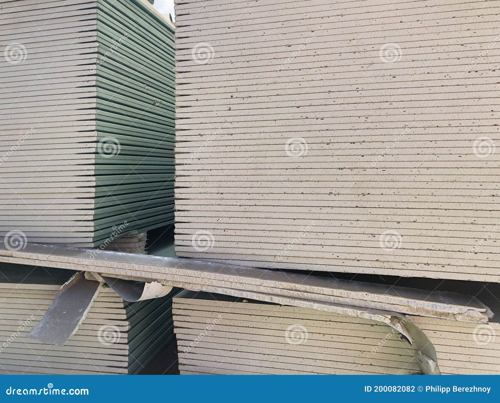Piled Sheets Of Drywall At The Construction Site. Stacked Plasterboard ...