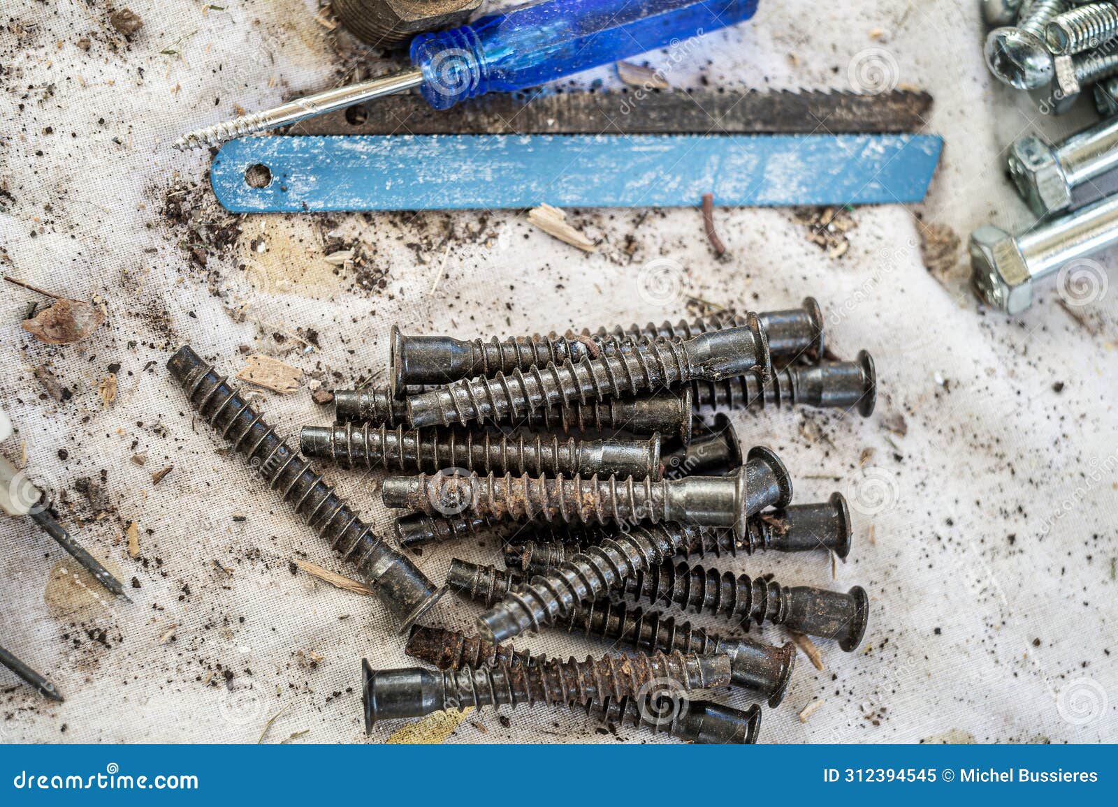 Piles of Bolts Tools and Different Hardware on a Drop Sheet Stock Image ...