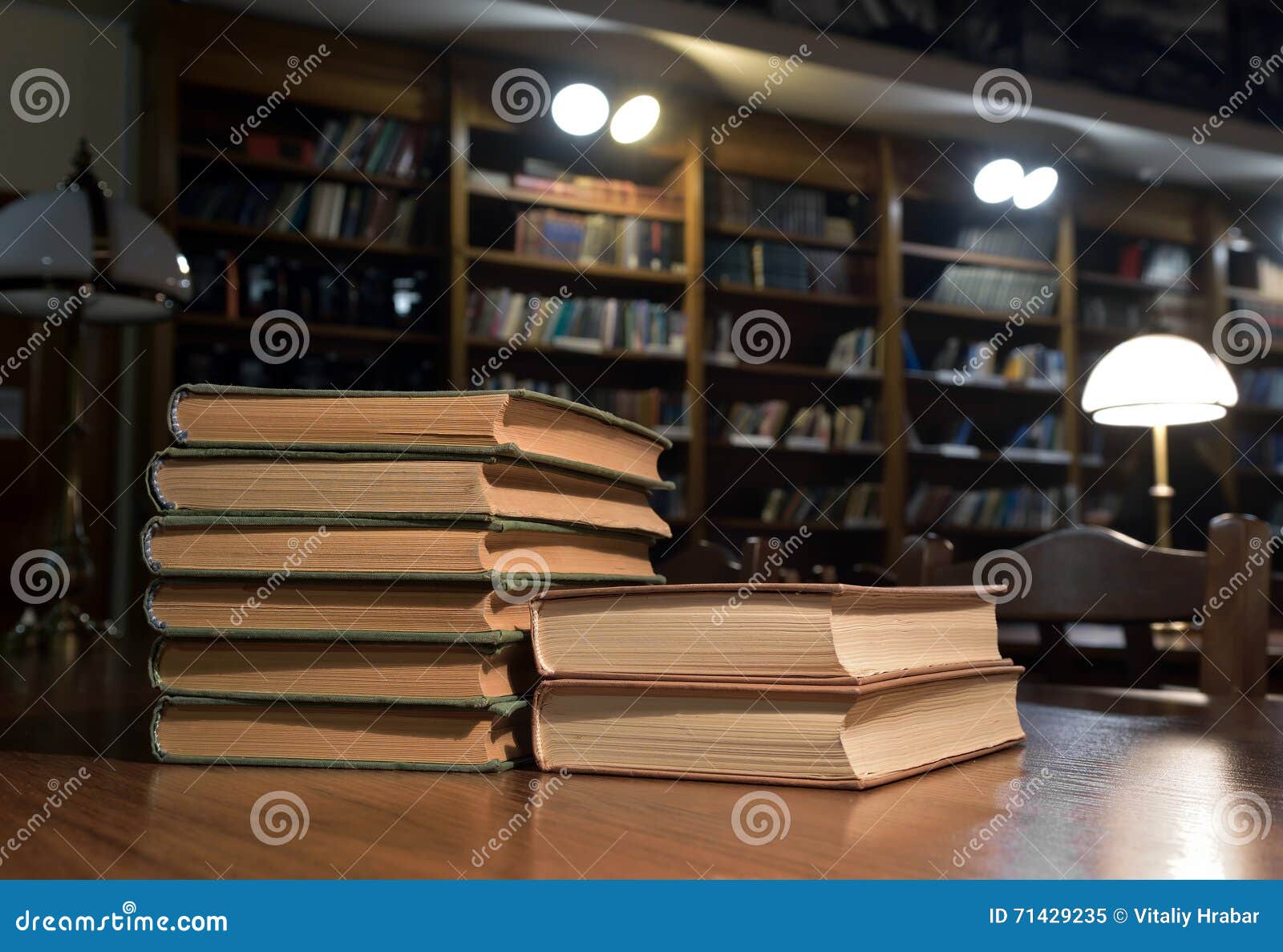 Piles of books on table stock image. Image of massive - 71429235