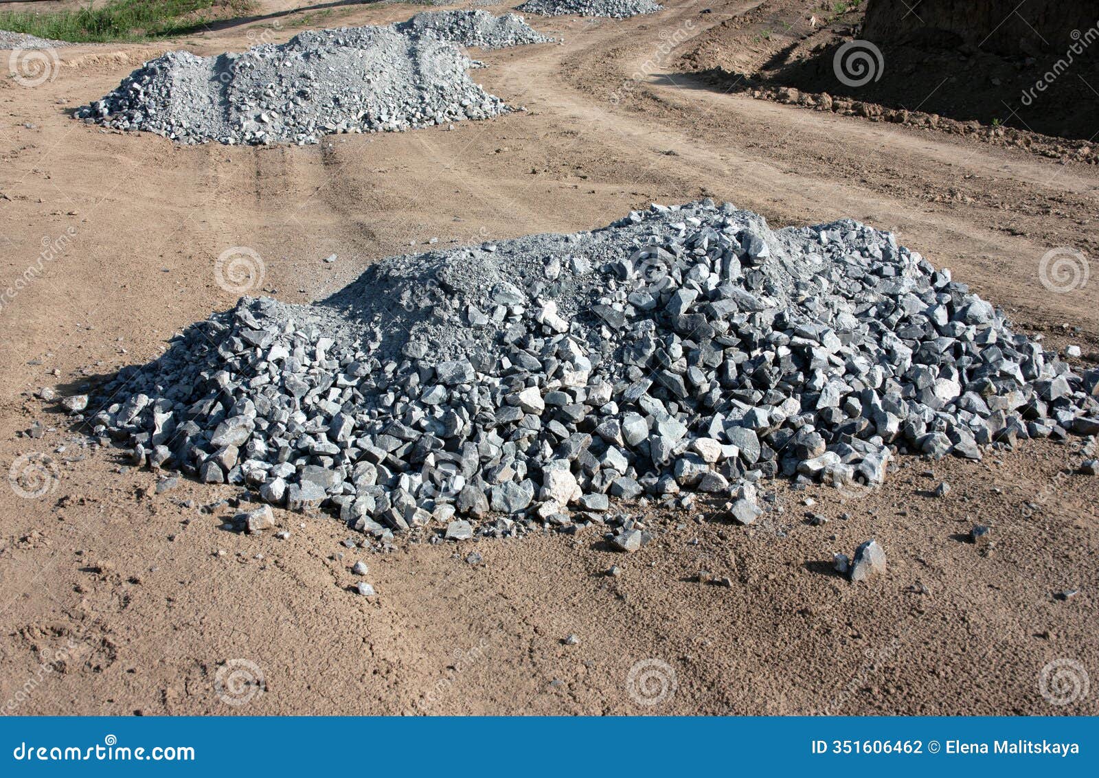 Piles of Granite Rubble are Scattered on the Ground. Start of Road ...
